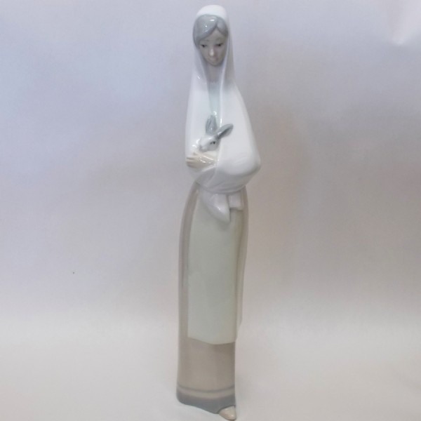 Spanish Nao figurine of a lady holding gray rabbit - South Perth ...