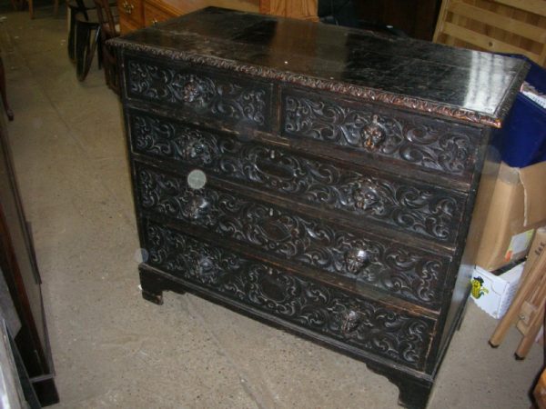 An oak carved chest of drawers. - South Perth Antiques & Collectables