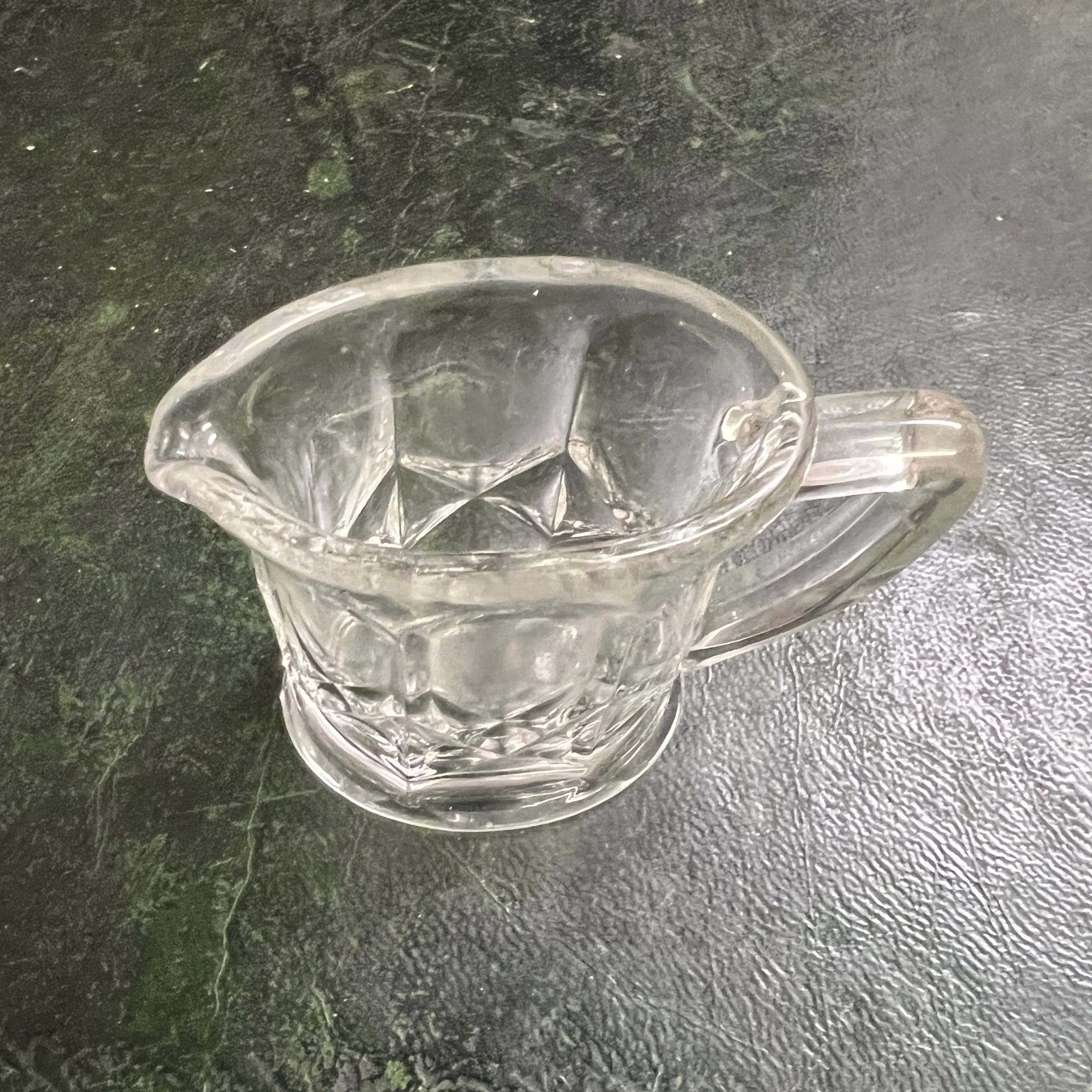 A small clear glass jug - South Perth Antiques & Collectables
